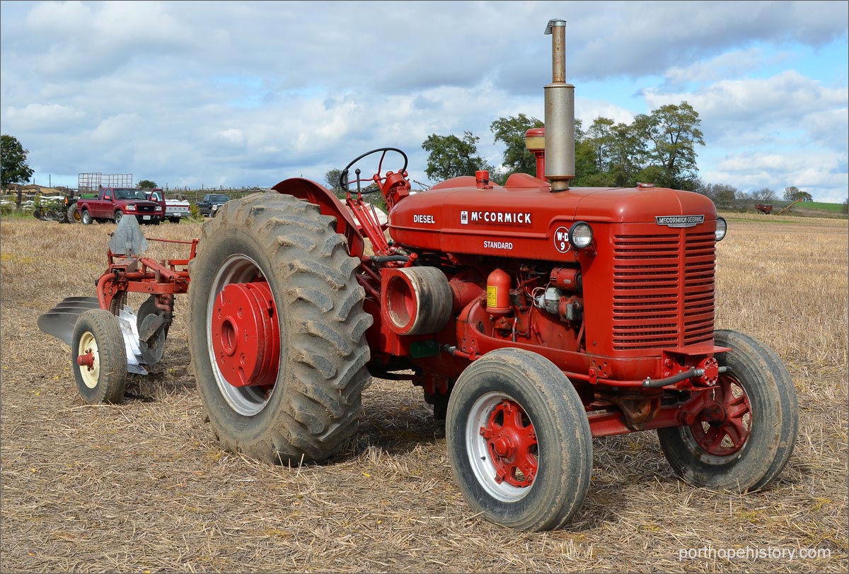 Tractor with plough